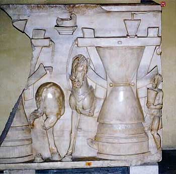 Hourglass shaped millstones