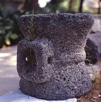 Hourglass shaped millstones