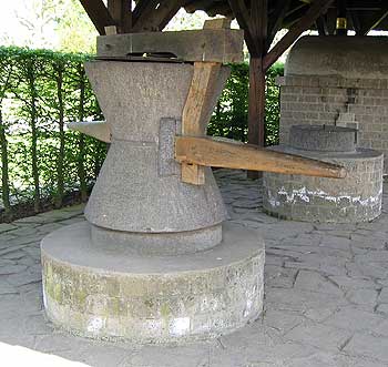 Hourglass shaped millstones